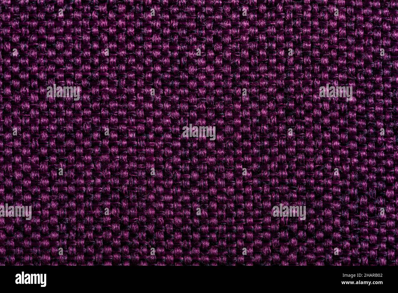 Purple fabric texture. Furniture upholstery textiles. Embossed pattern ...