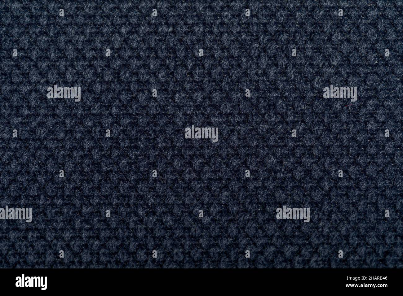 Black fabric texture. Furniture upholstery textiles. Embossed pattern ...