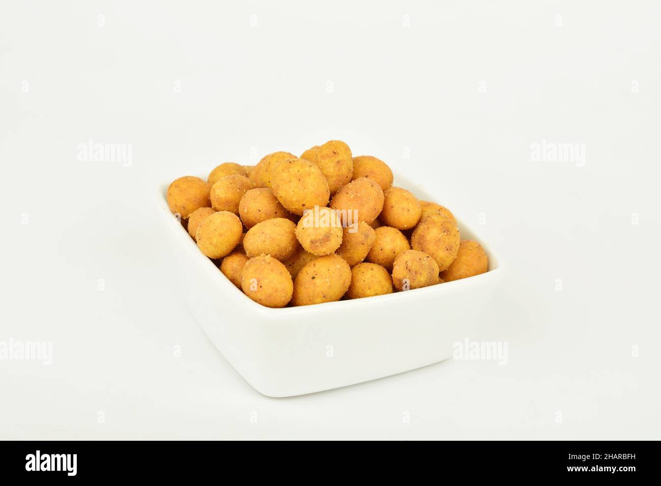 Coated Peanuts in Bowl Isolated on White Background Stock Photo - Alamy