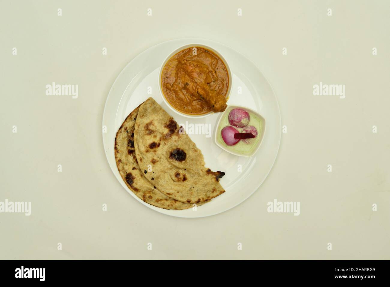 Butter Chicken with Roti in Plate isolated on White Background Stock ...