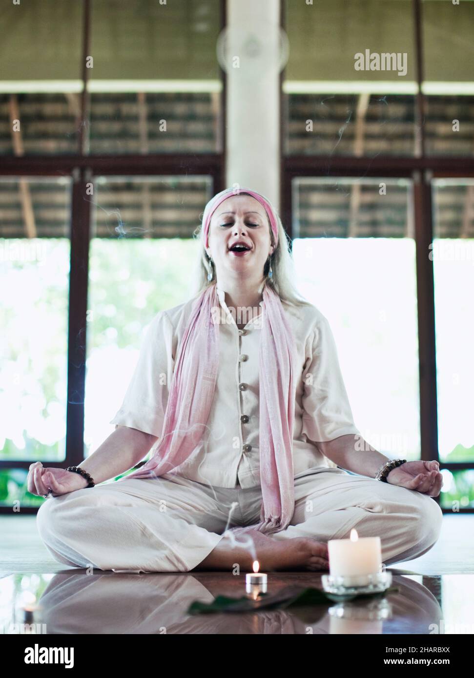 Women Chanting at Kamalaya, Koh Samui, Thailand. Women chant Sanskrit ...