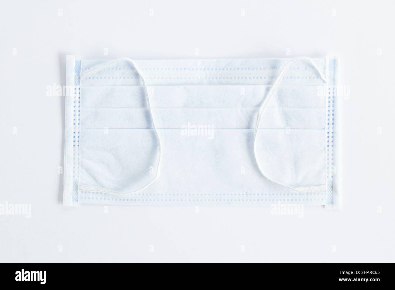 Three ply structure,single use hygenic face mask on white background ...