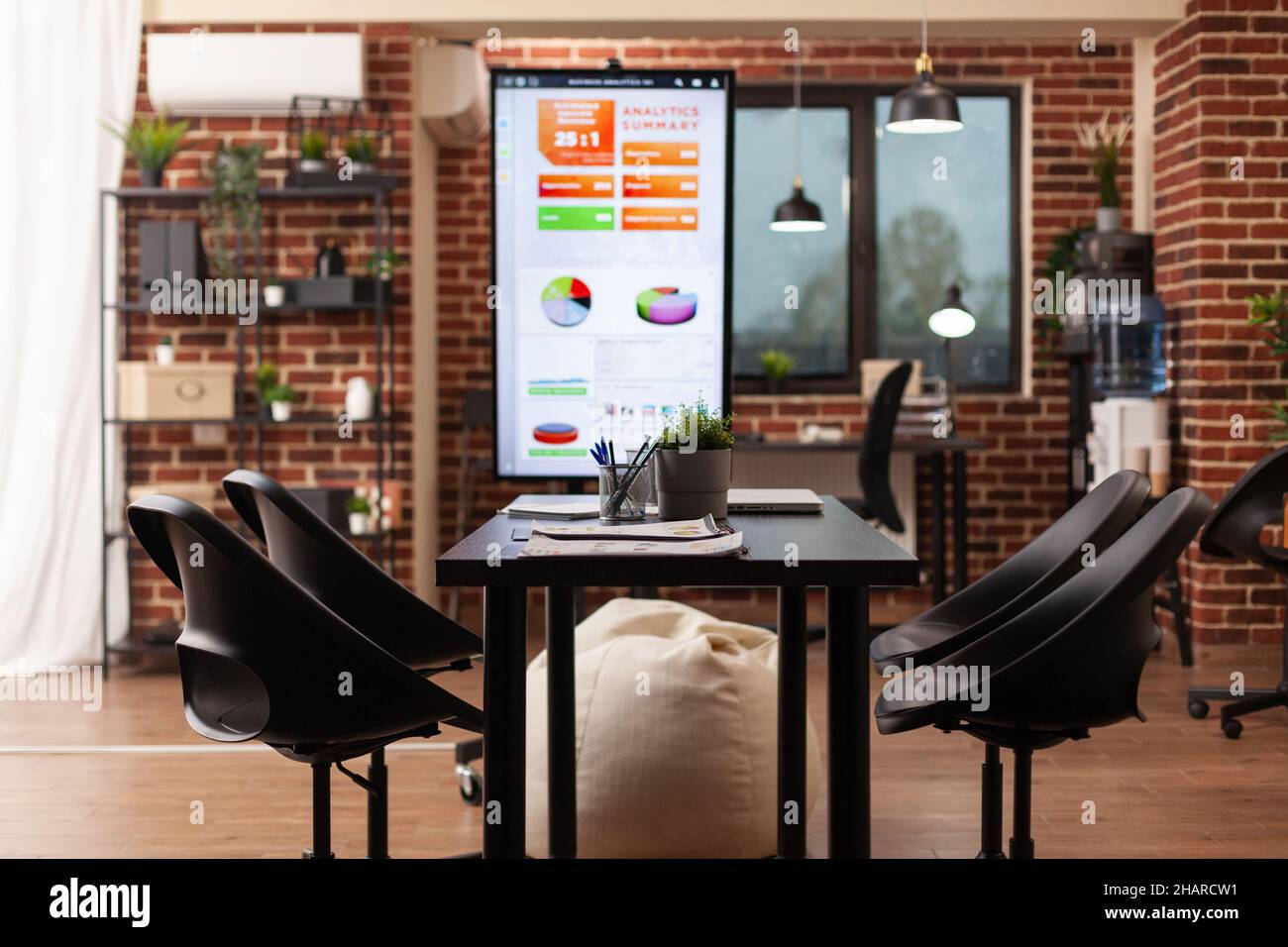 Empty start-up office with modern design during management meeting ...