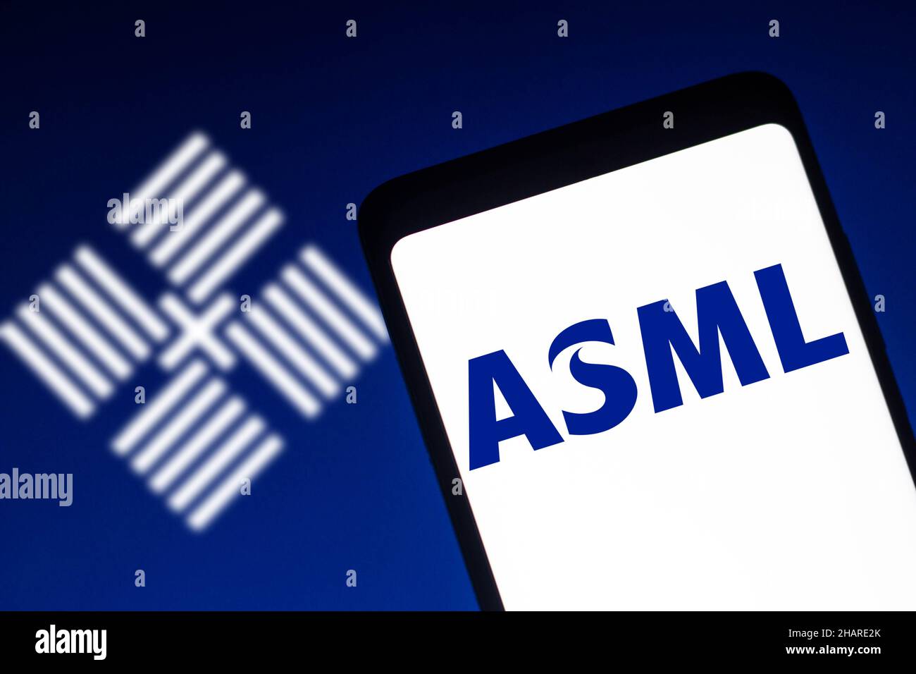In this photo illustration the ASML Holding logo seen displayed on a ...