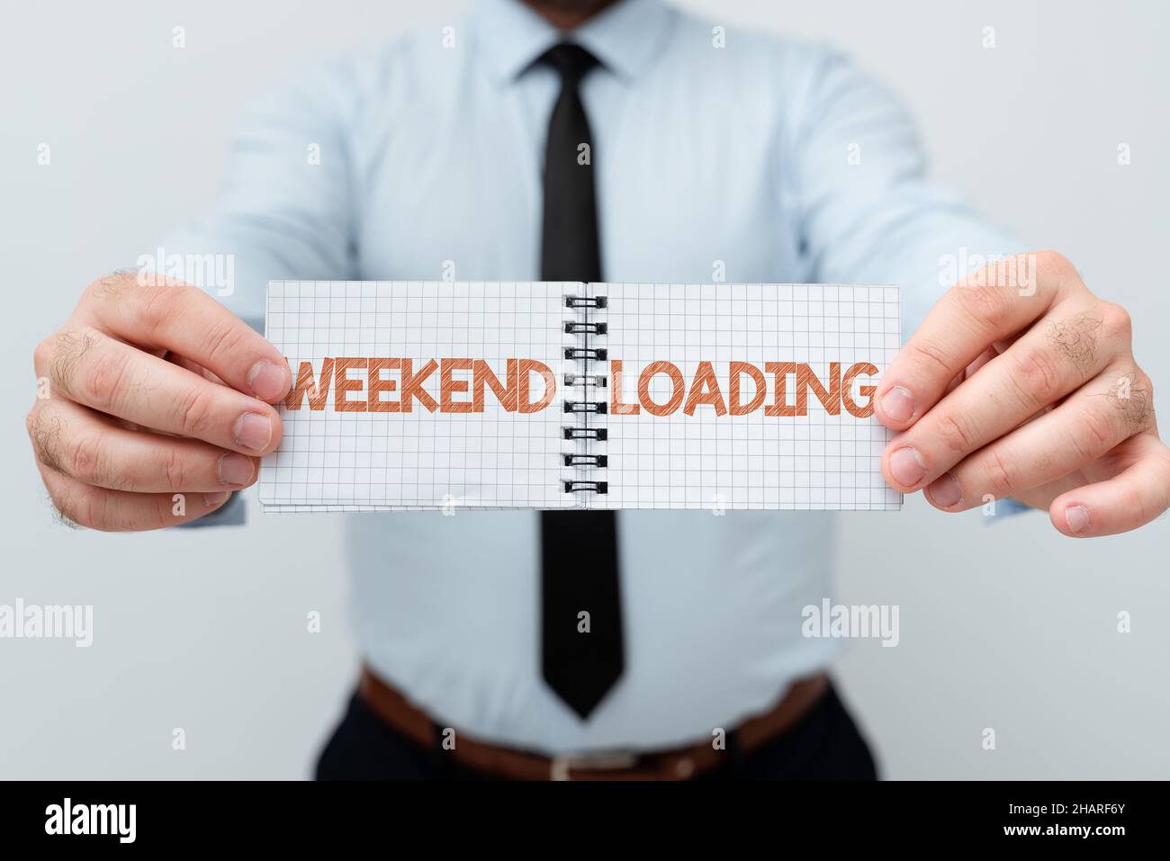 Hand writing sign Weekend Loading. Business approach Starting Friday ...