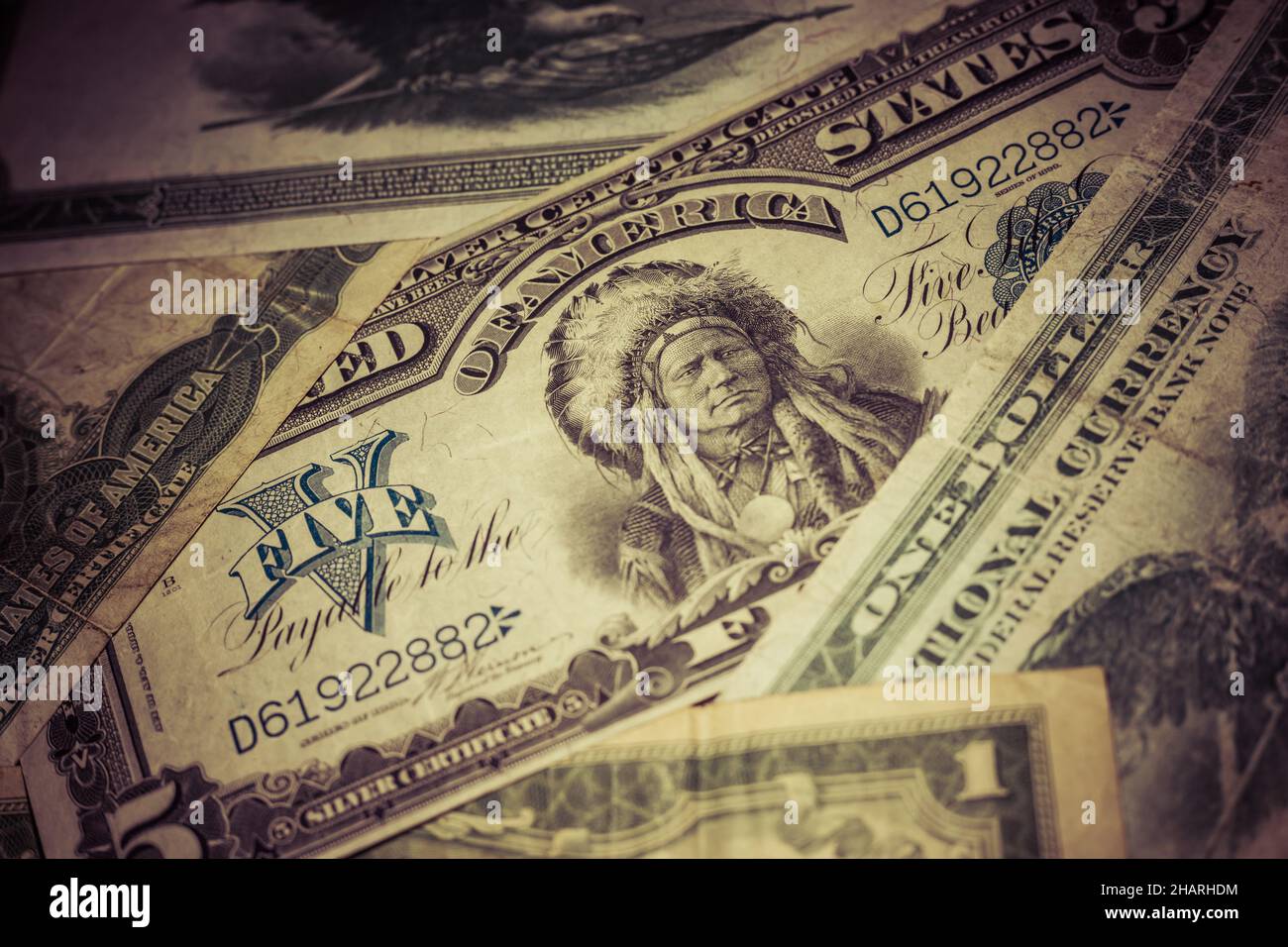 Closeup shot of the Indian Chief portrait on the five dollar banknotes ...