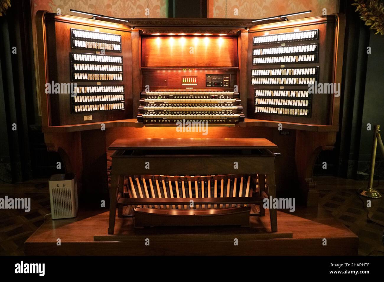 A pipe organ illuminated with lights Stock Photo - Alamy