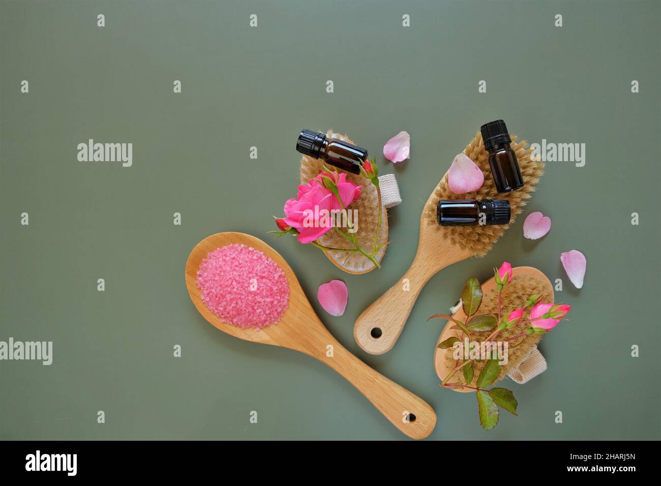 Rose essential oil and cosmetics salt with rose extract.Aromatherapy ...