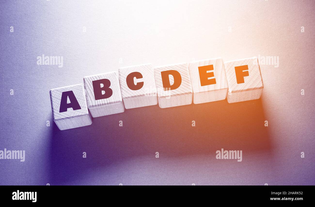 Alphabet English Word Written on Wooden Cubes Stock Photo - Alamy