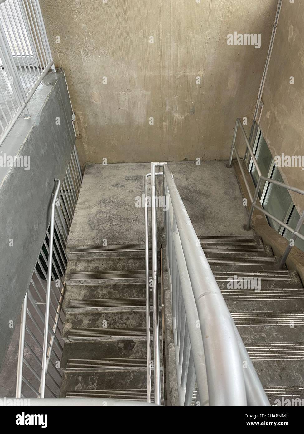 a concrete vintage creepy stair well Stock Photo - Alamy