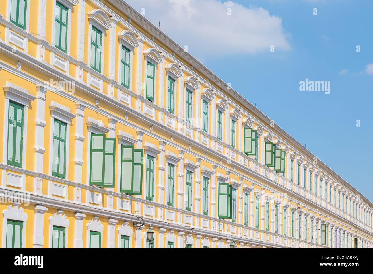 abstract row of the orange colored building with blue sky background ...