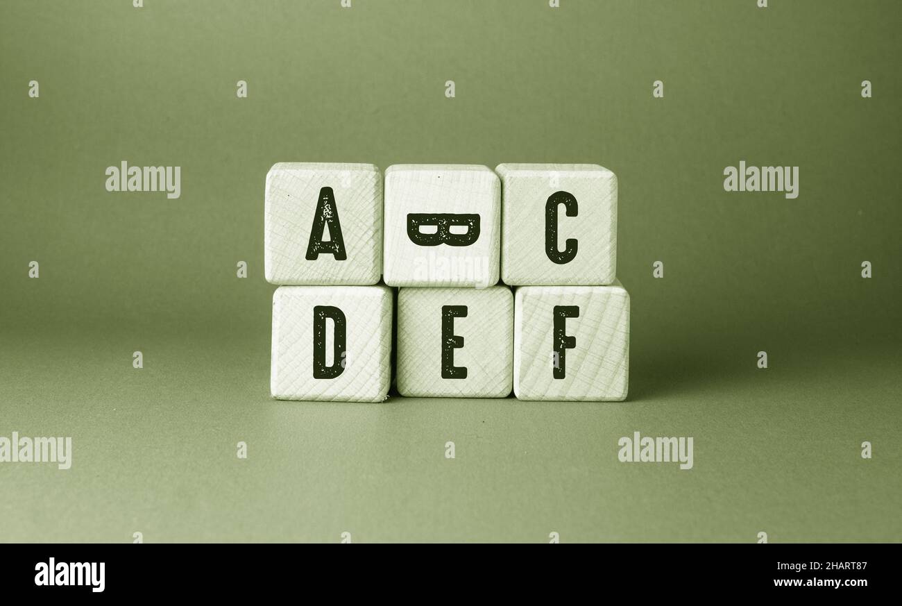 English Text Written on Wooden Cubes Stock Photo - Alamy