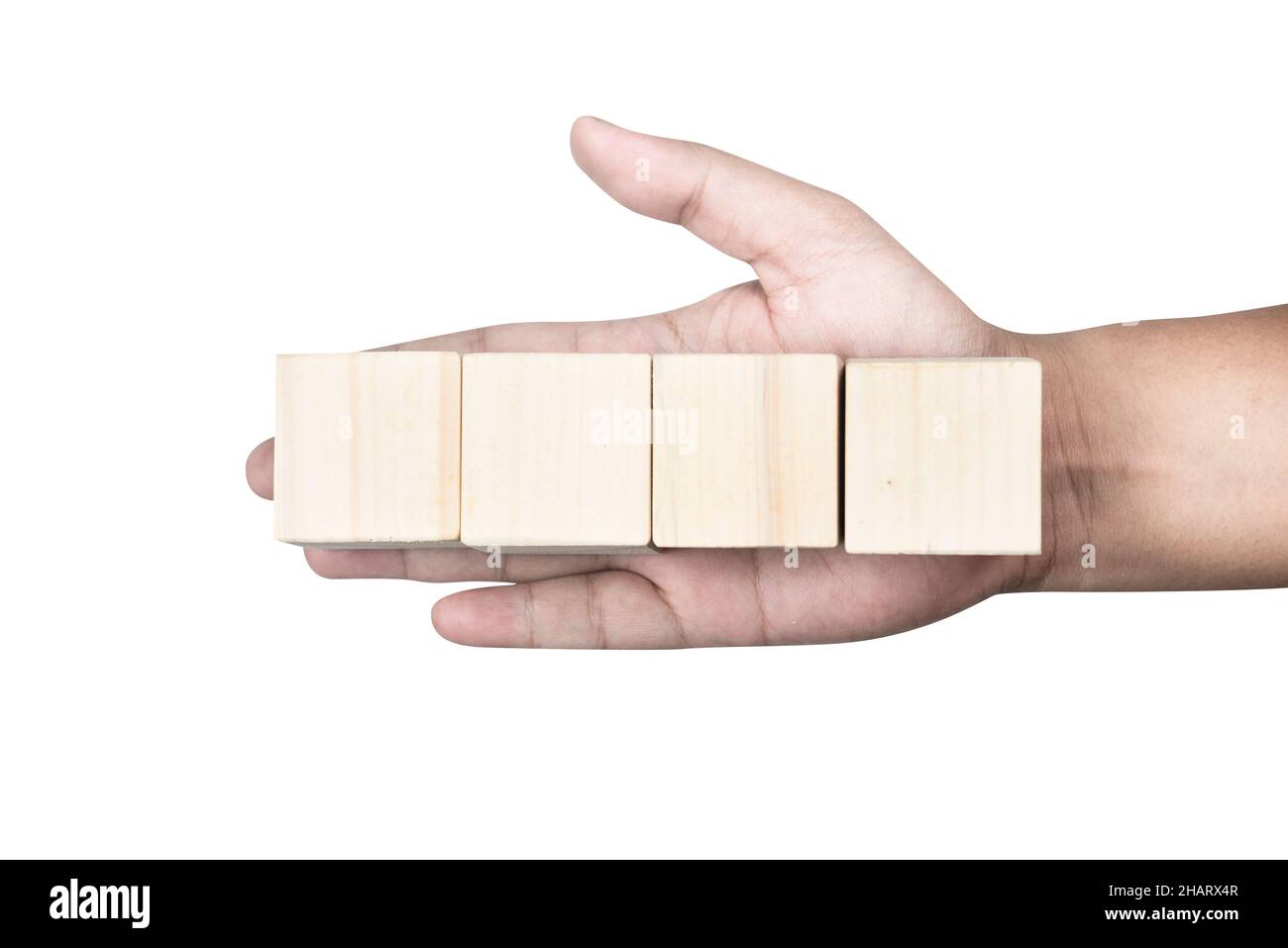 Hand holding wooden block toy isolated over white background Stock ...