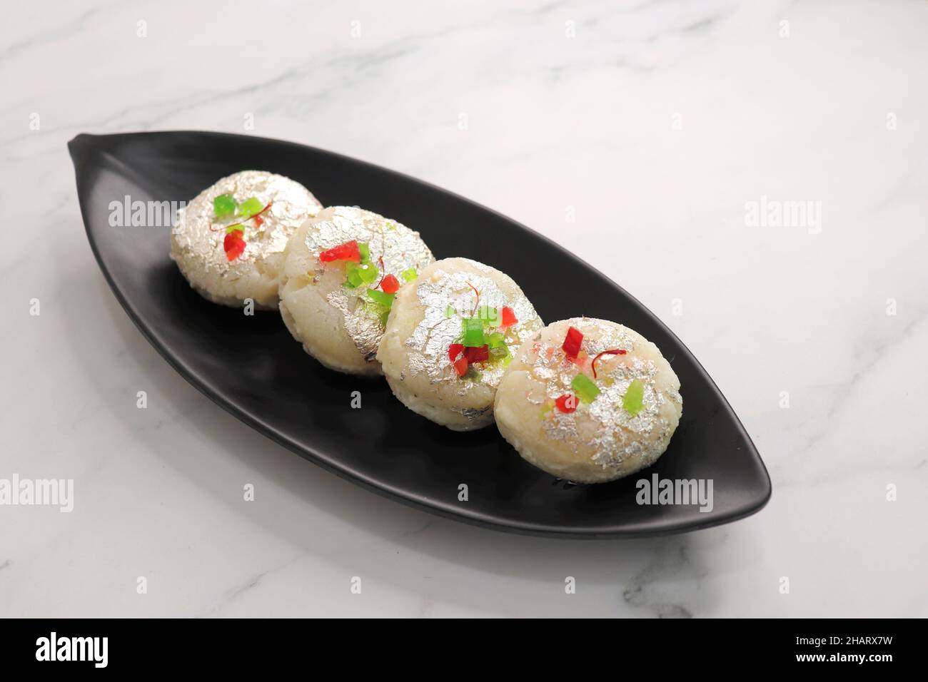 Rasmalai or Malai Sandwich, Roshmolai, Rasamalei is very popular Indian ...