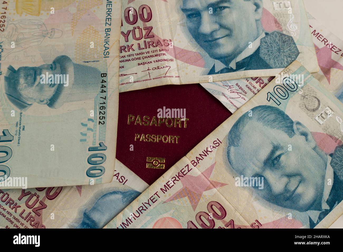 Turkish common passport on the white surface with some Turkish ...