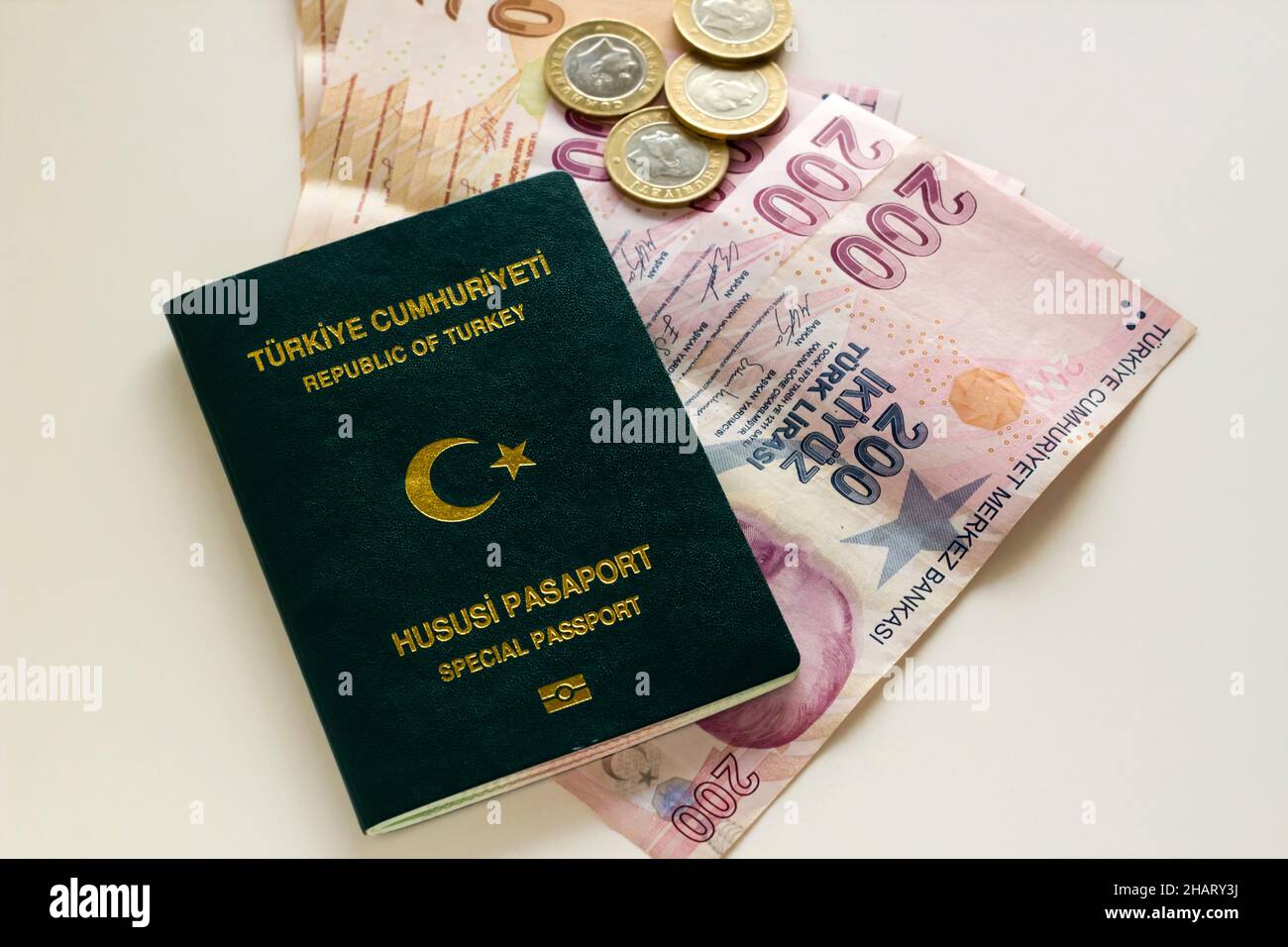 Turkish,green color officer passport and Turkish money banknotes on the ...