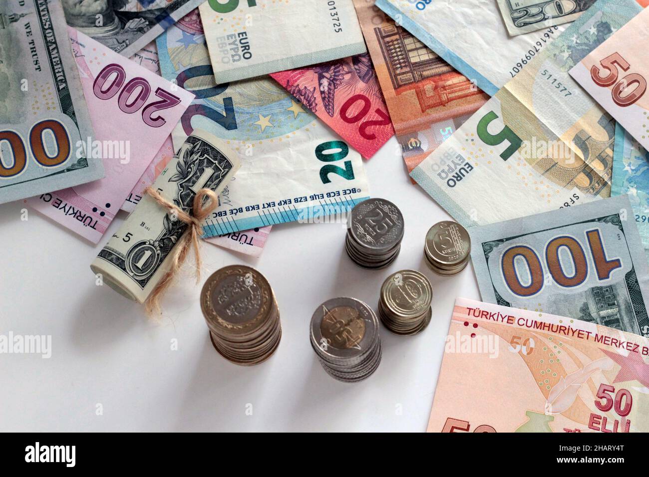 Turkish currency coins stacked and growing on white surface with ...