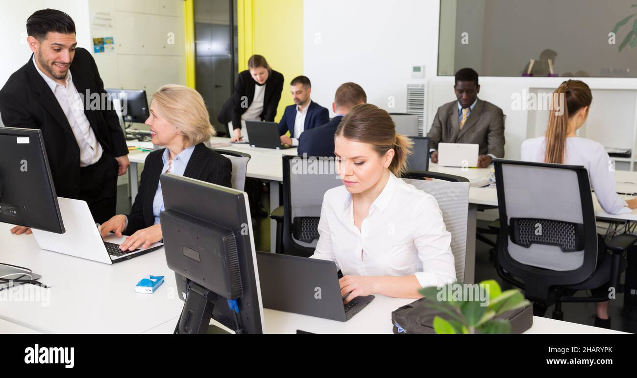 Coworkers in office people in coworking open space office hi-res stock ...