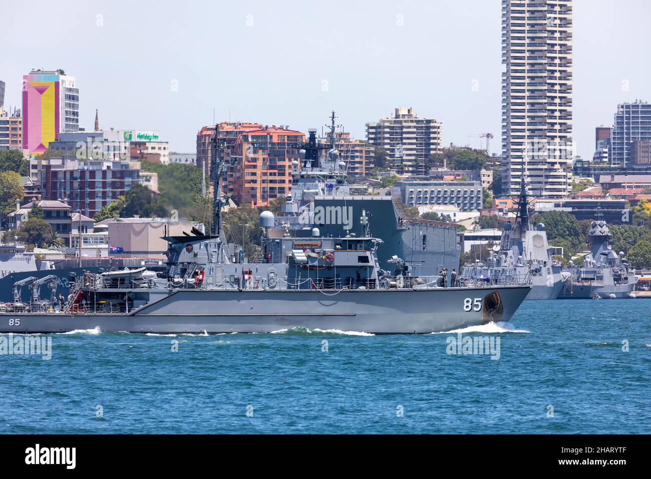 HMAS Gascoyne M85 a Huon class minehunter on Sydney harbour near garden ...