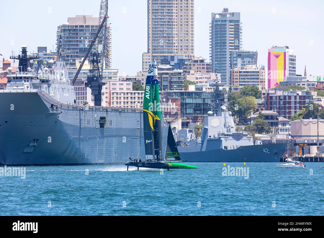 Garden Island naval base with HMAS Canberra and the australian Sail GP ...