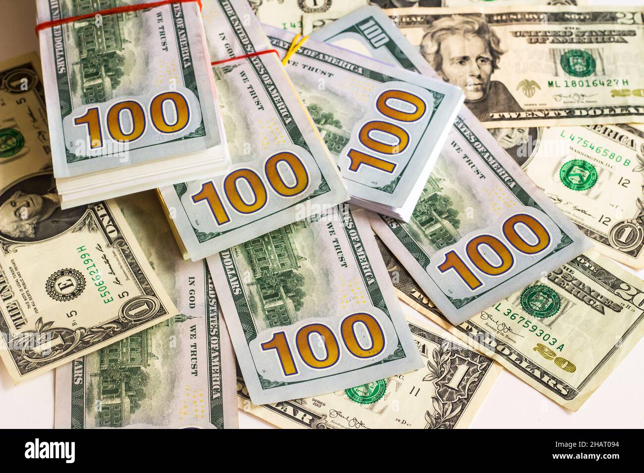 American dollar banknotes with back side on white surface,above view ...