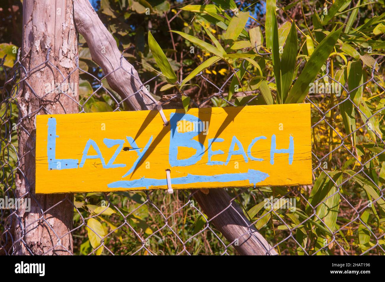 a hand painted sign on the jungle trail between Saracen Bay & Lazy ...