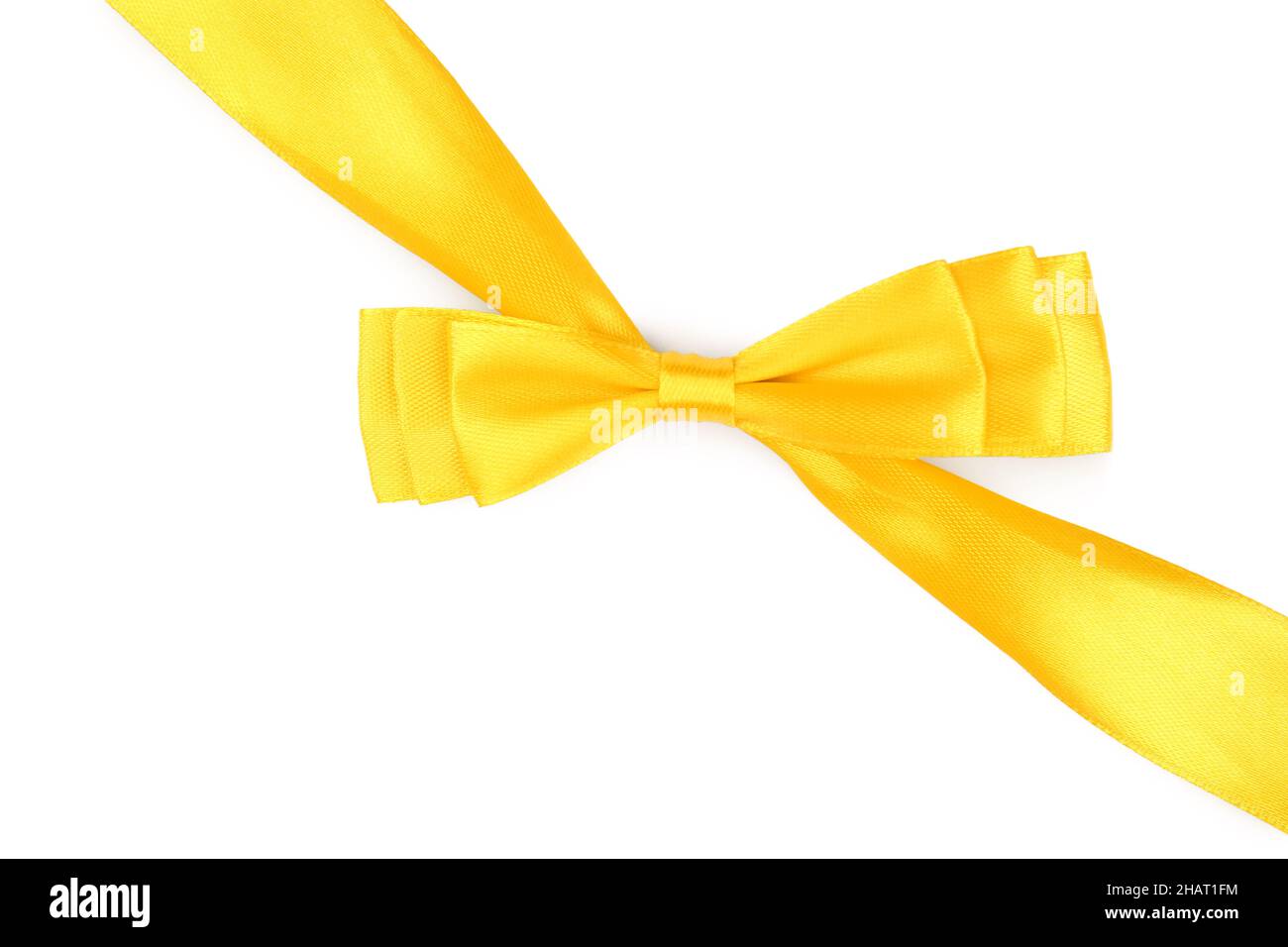 Bow made of yellow ribbon on white background Stock Photo - Alamy