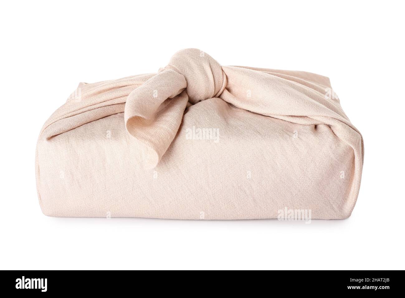 Gift box wrapped in cloth on white background Stock Photo - Alamy