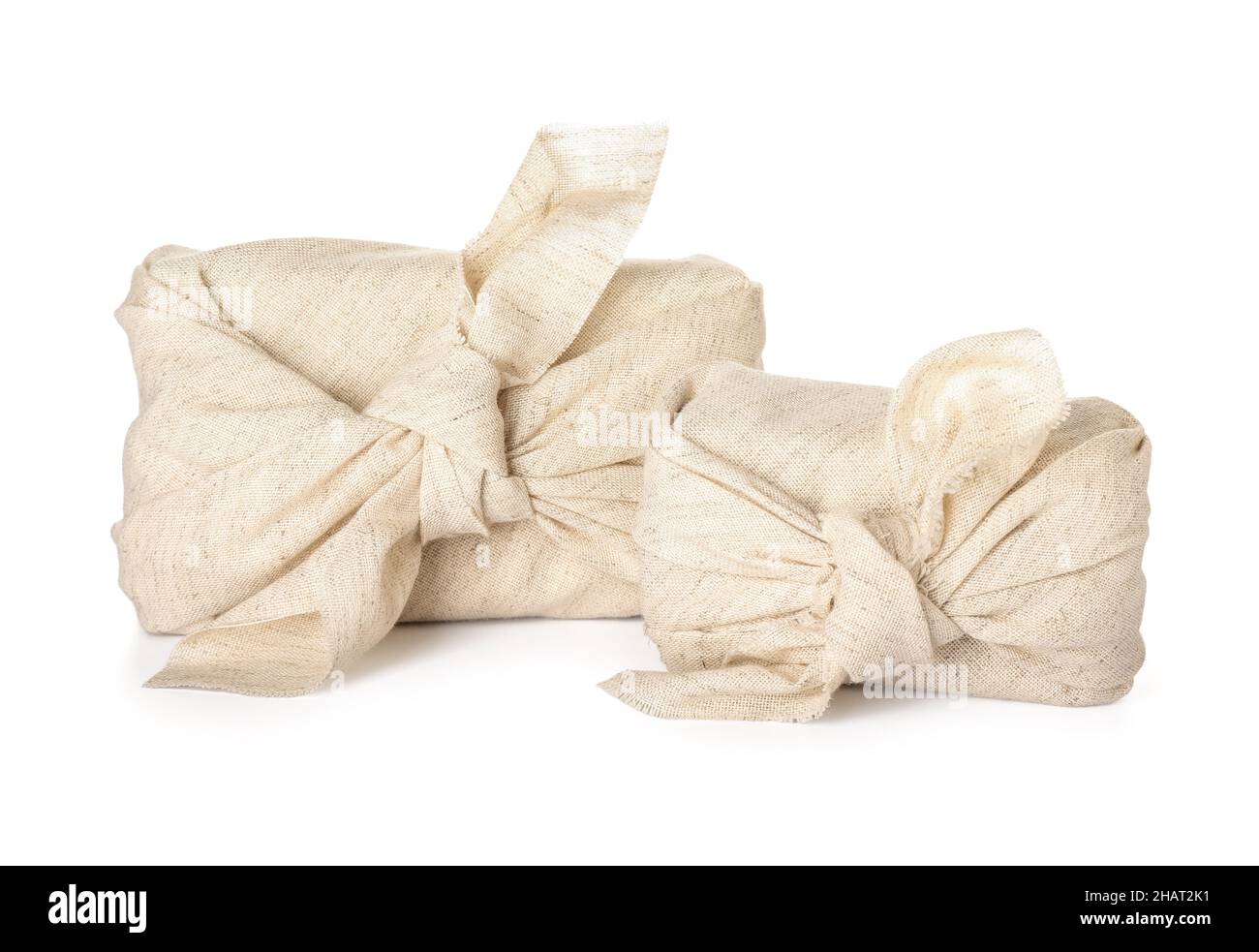 Gift boxes wrapped in fabric isolated on white background Stock Photo ...