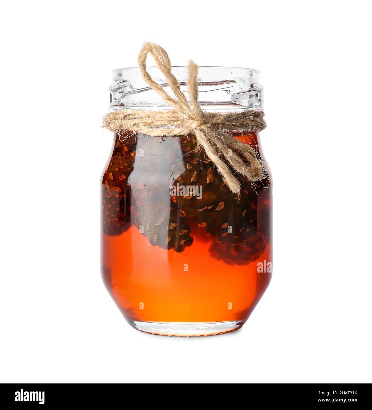 Jar of tasty pine cone jam on white background Stock Photo - Alamy