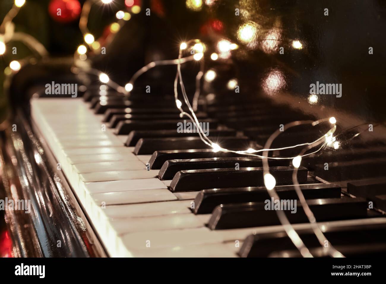 Glowing lights on piano keys, closeup Stock Photo - Alamy