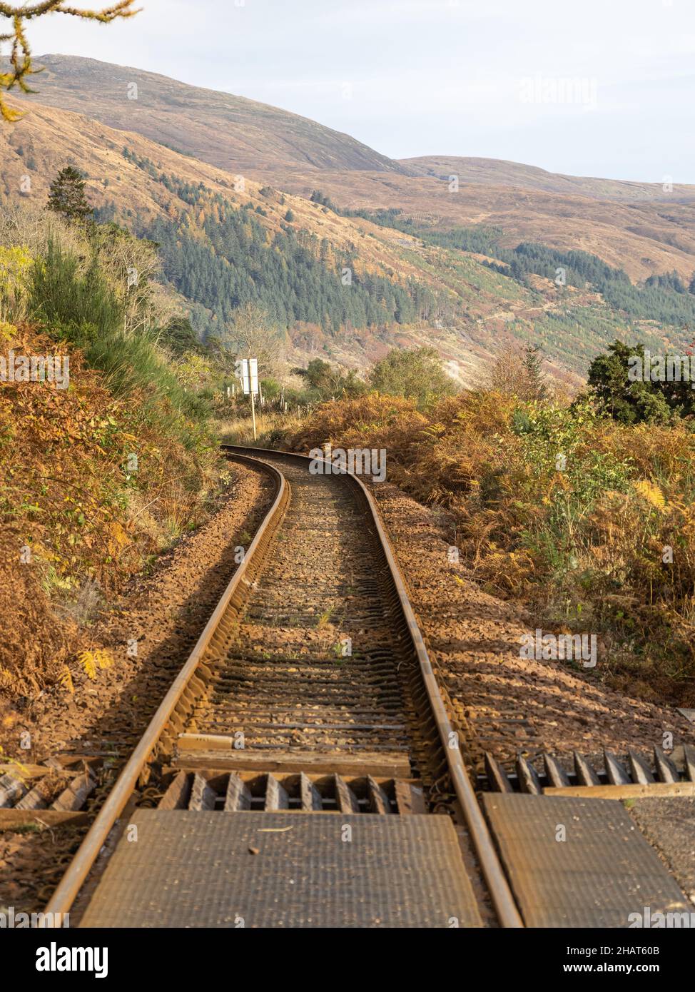 Railway line from Kyle of Lochalsh to Inverness crossing the A890 at ...