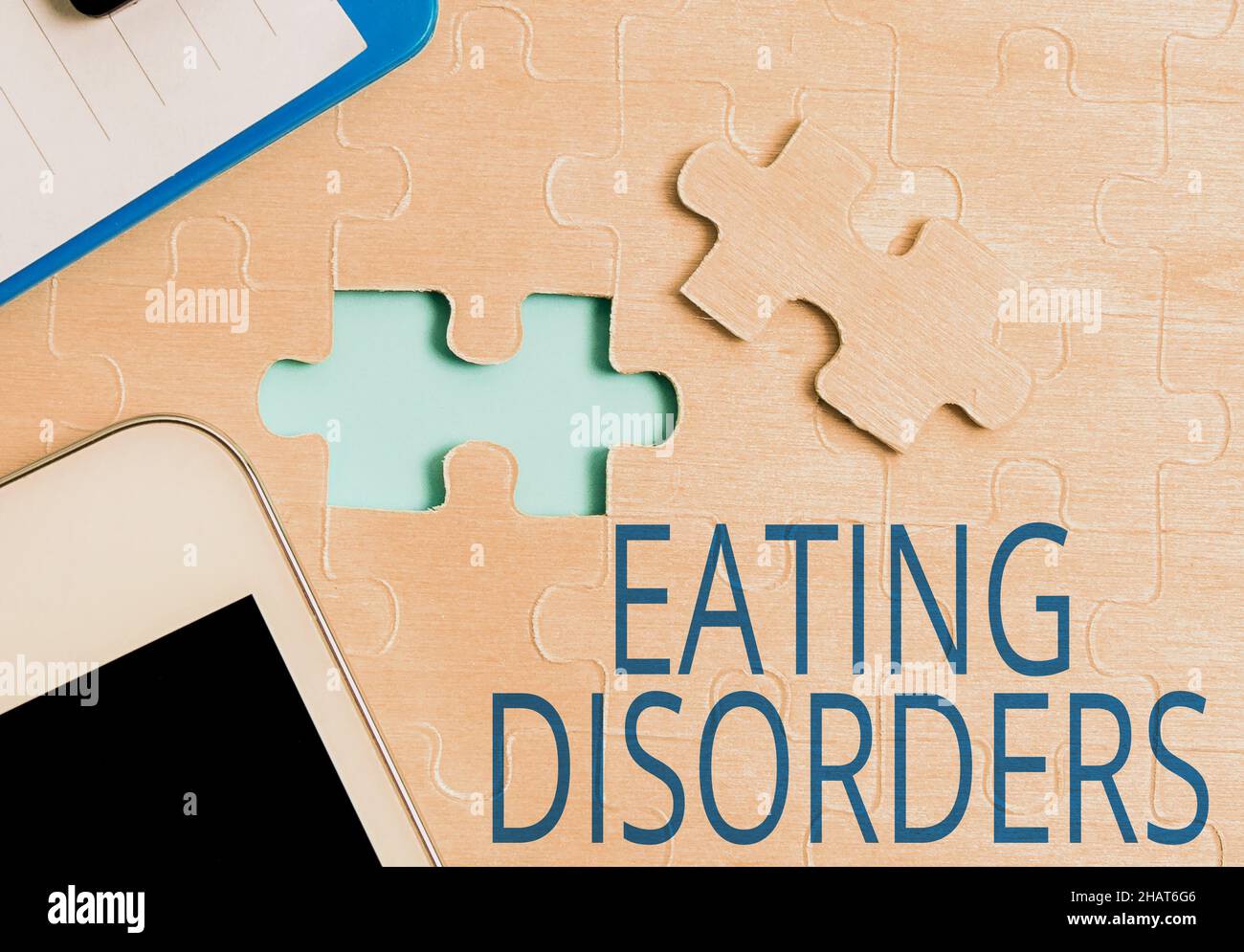 Text caption presenting Eating Disorders. Word Written on any of a ...