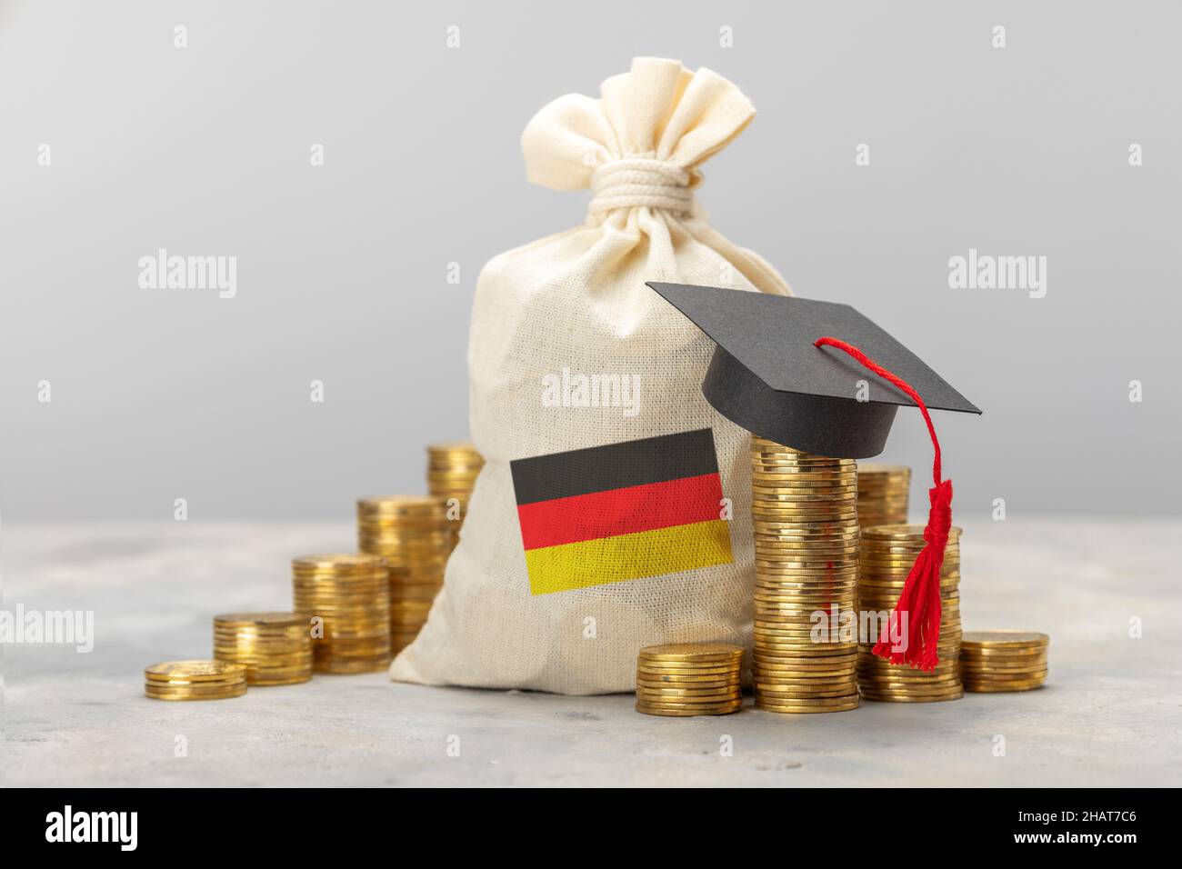 Education in Germany. Money bag and germany flag and graduate cap Stock ...