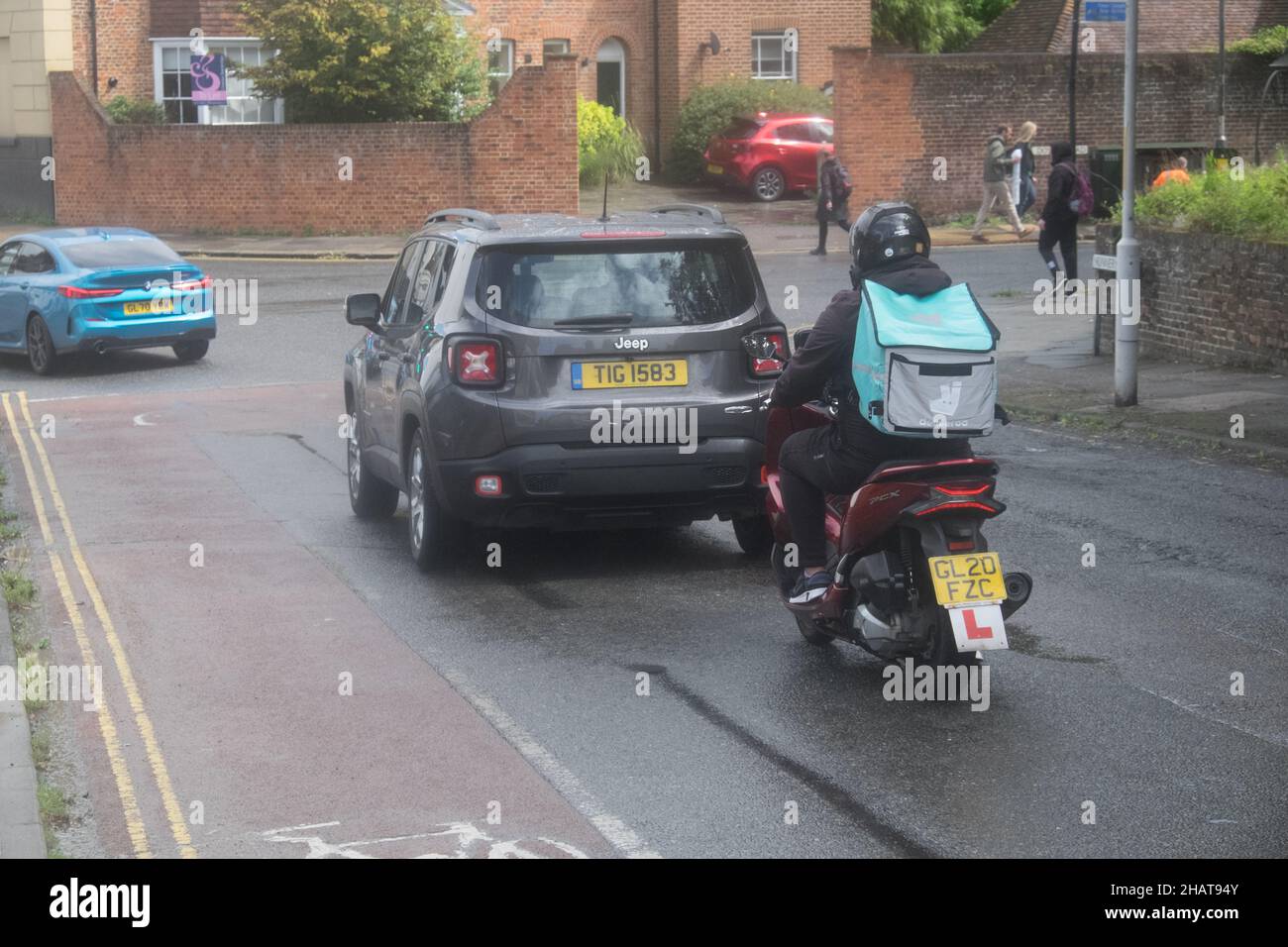 Deliveroo driver on a scooter hi-res stock photography and images - Alamy