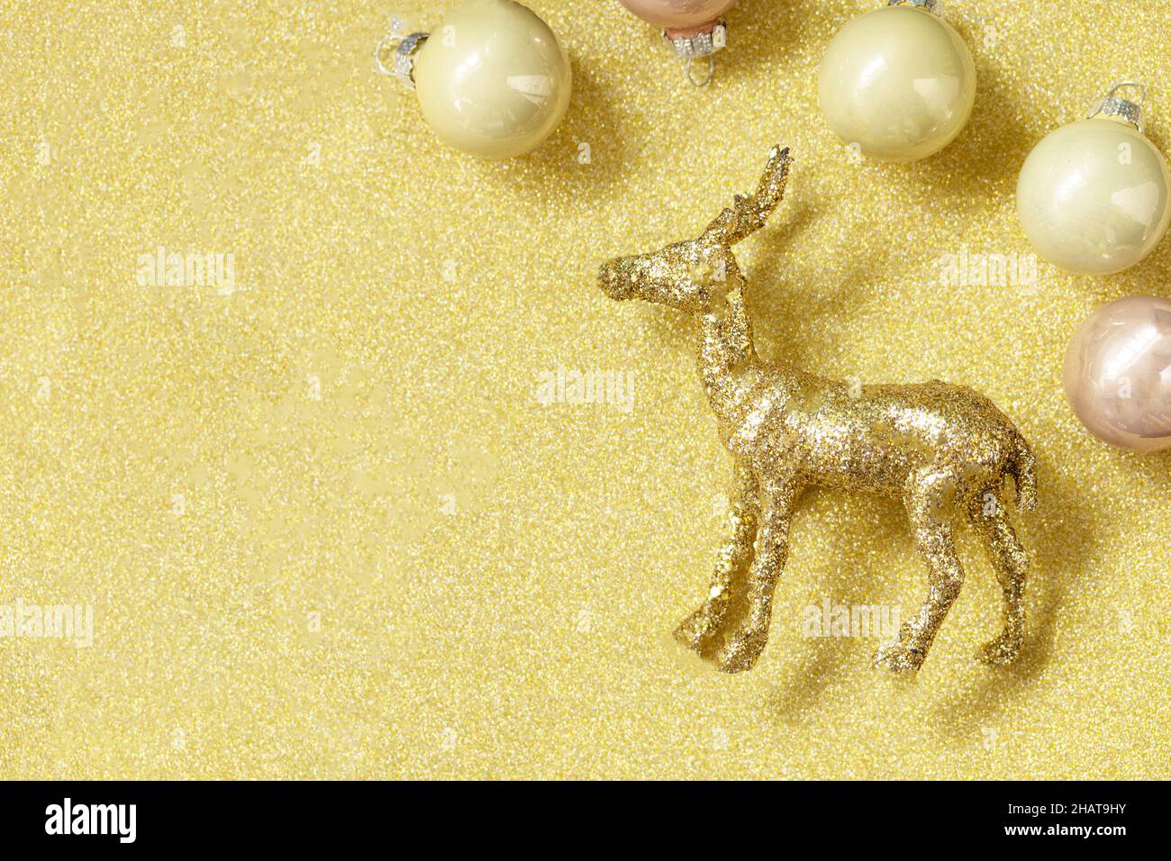 Magic of christmas. Christmas deer gold color palette with decor on a ...