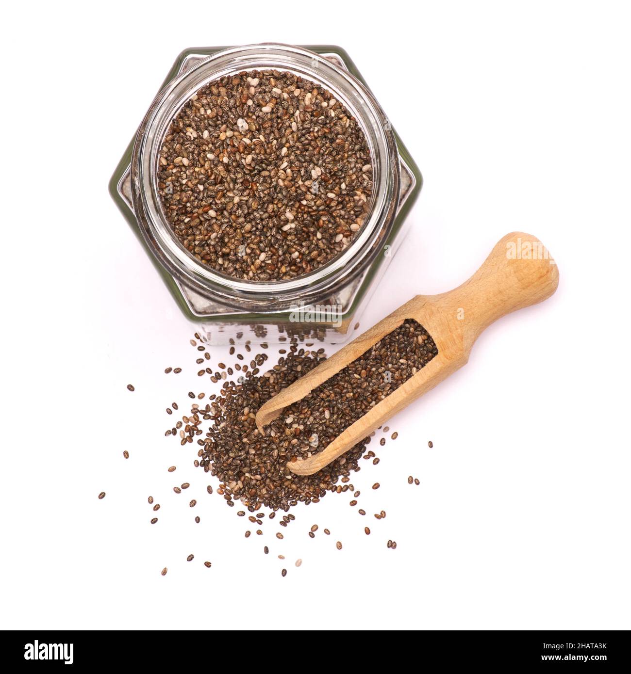 glass can full of organic natural chia seeds close-up isolated on white ...