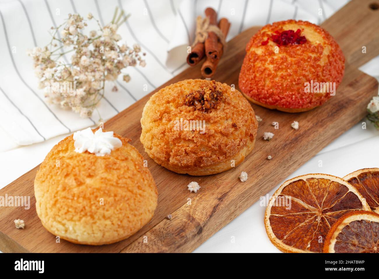 Homemade three shu cake with vanilla custard inside Stock Photo - Alamy