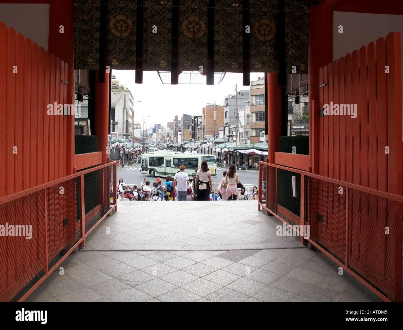 Japanese people and foreign travelers walking on Hanamikoji Street of ...