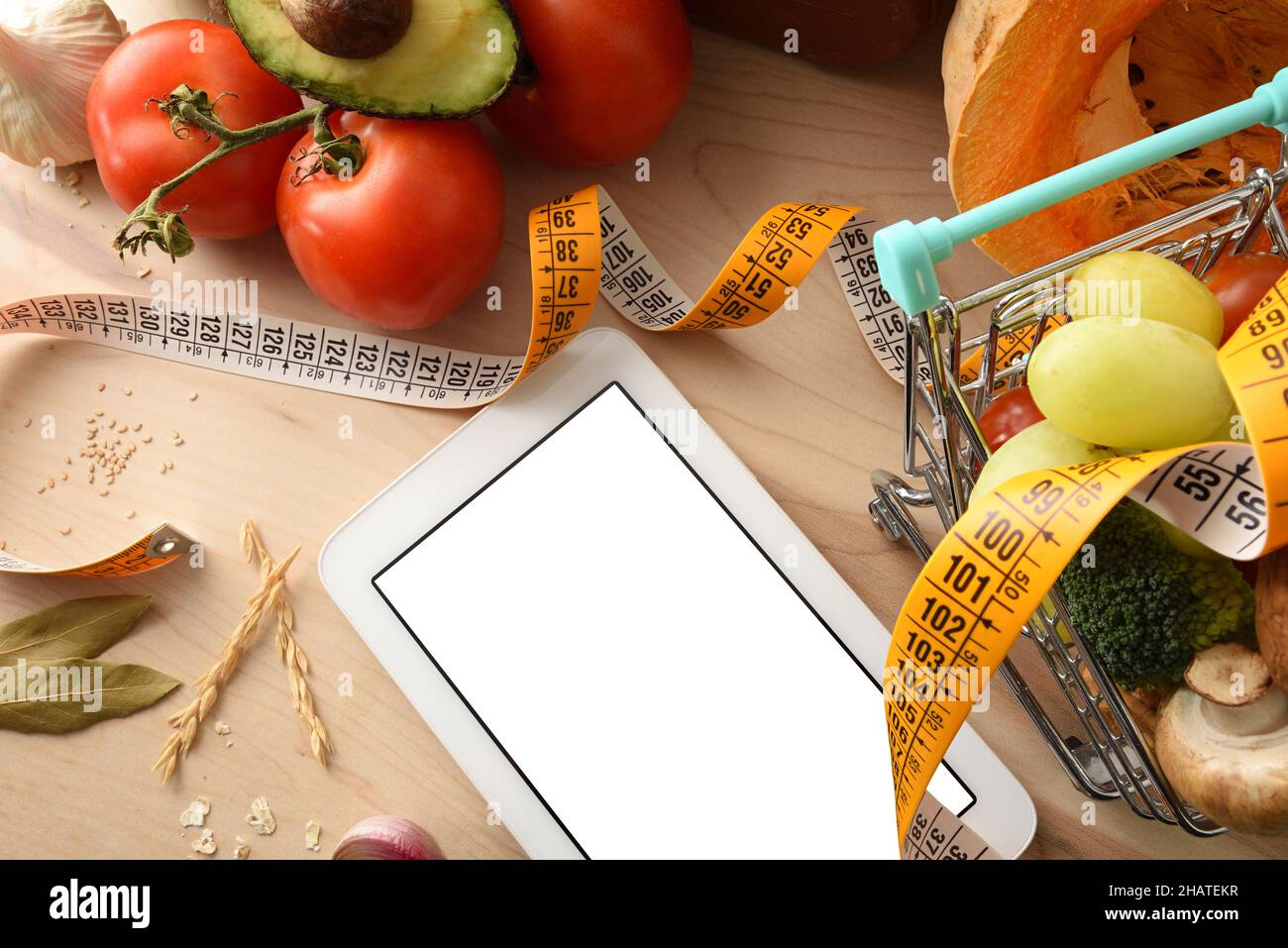 Blank electronic device on kitchen bench for list or digital recipe for ...