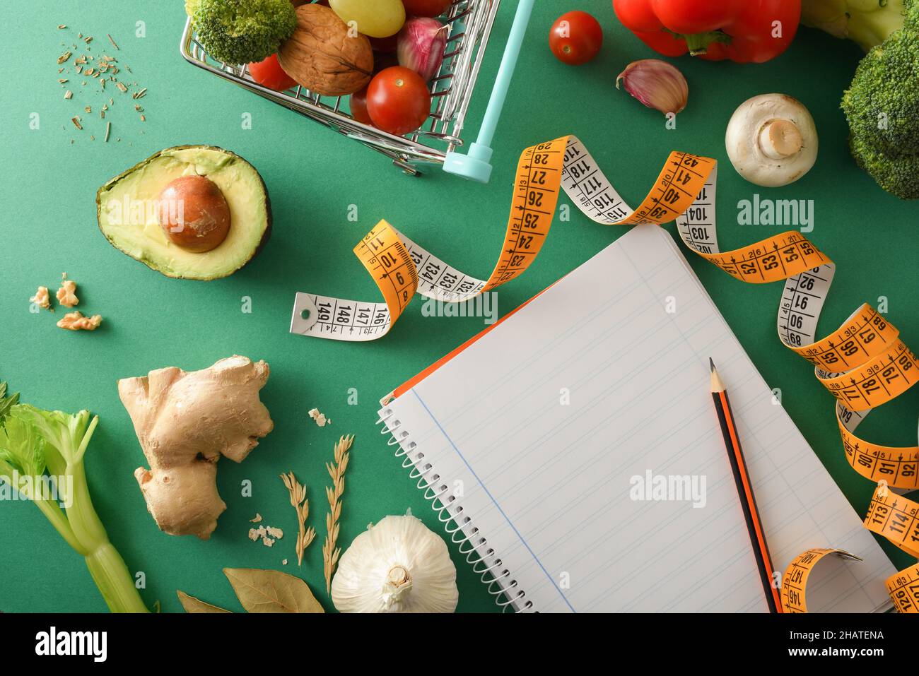 Preparation of ingredients for healthy cooking with notepad and ...