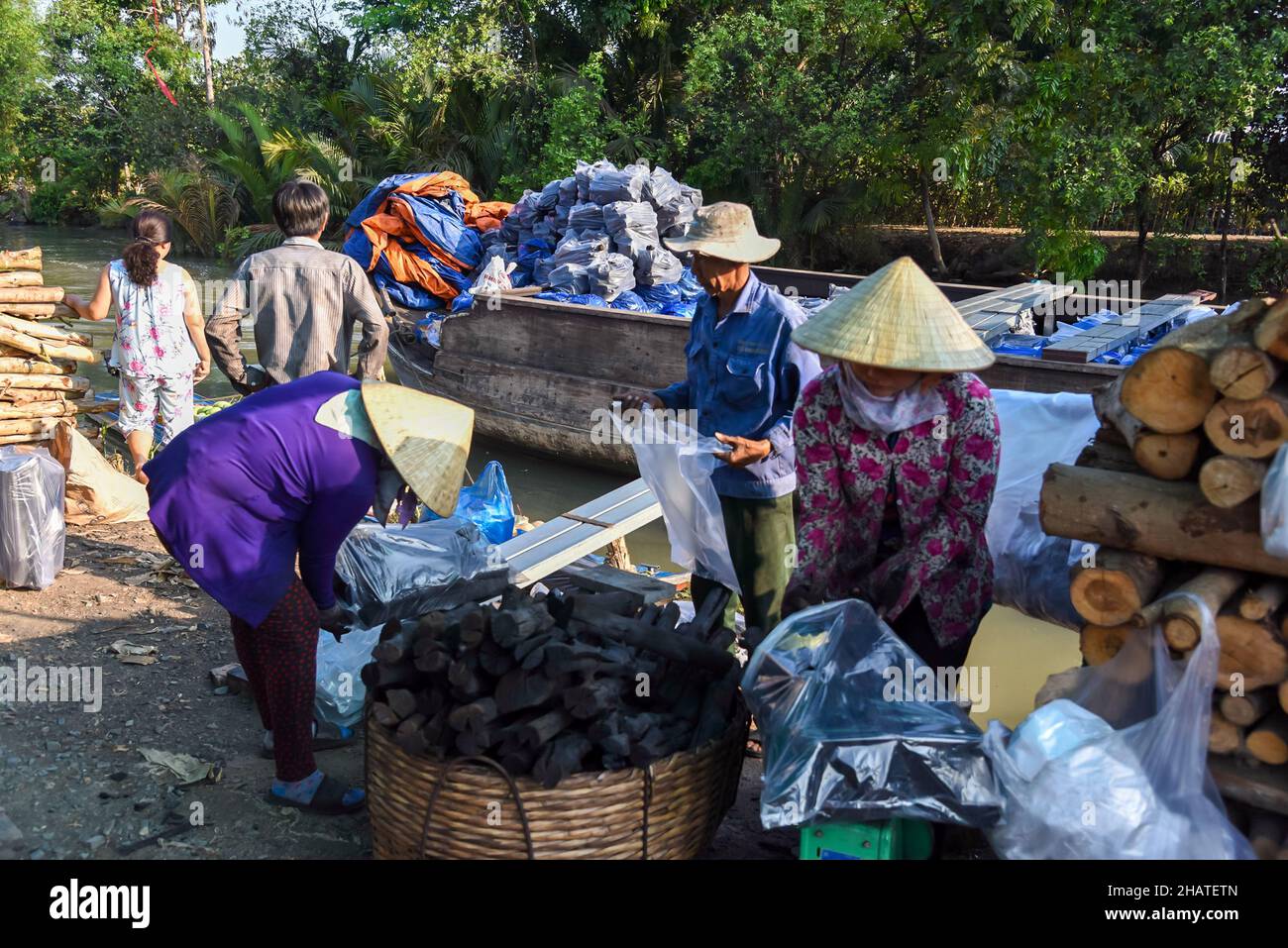 Coal furnace workers prepare to deliver goods to the market Stock Photo ...