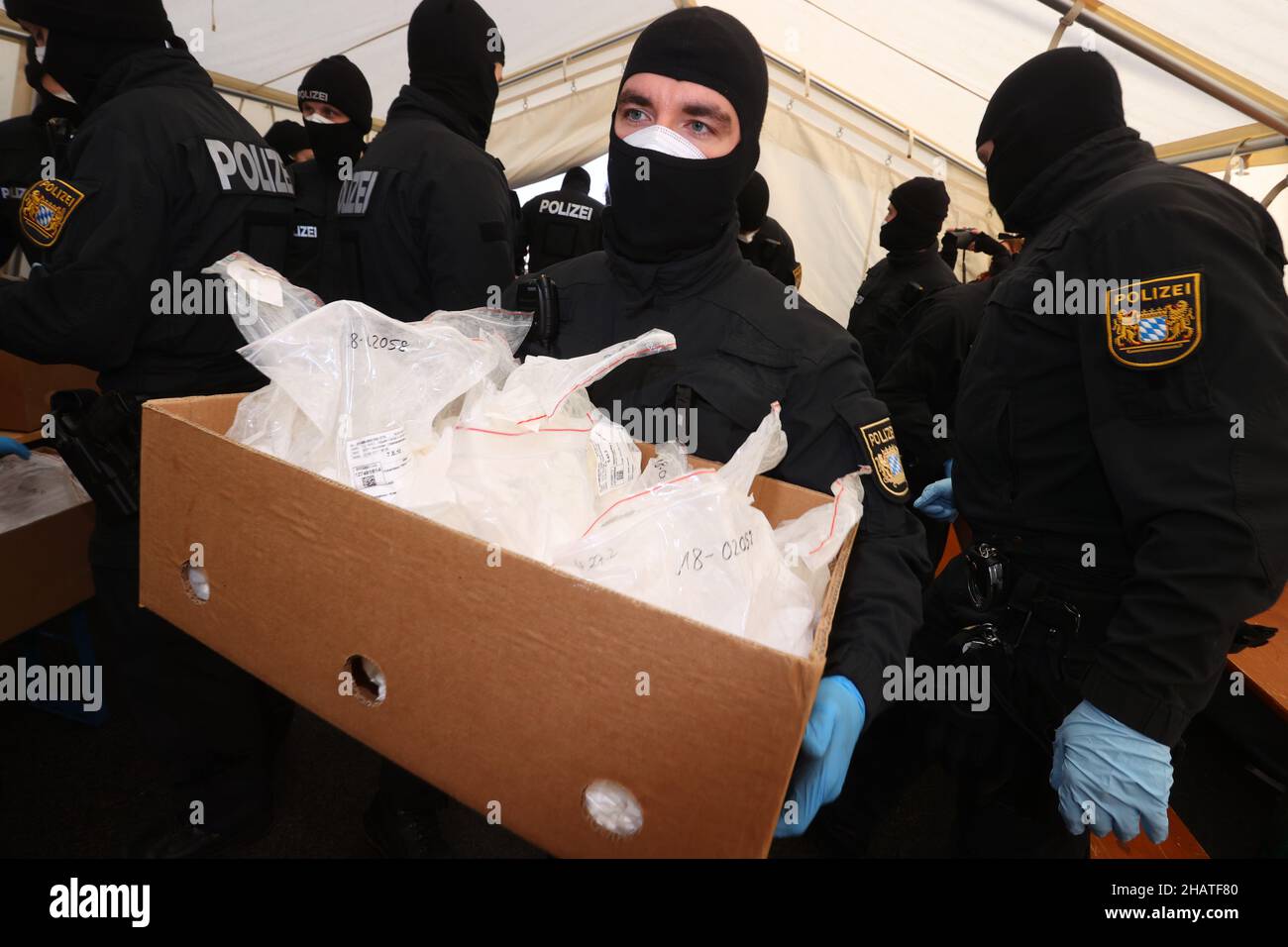 Germany. 14th Dec, 2021. Bavarian riot police officers prepare bags of ...