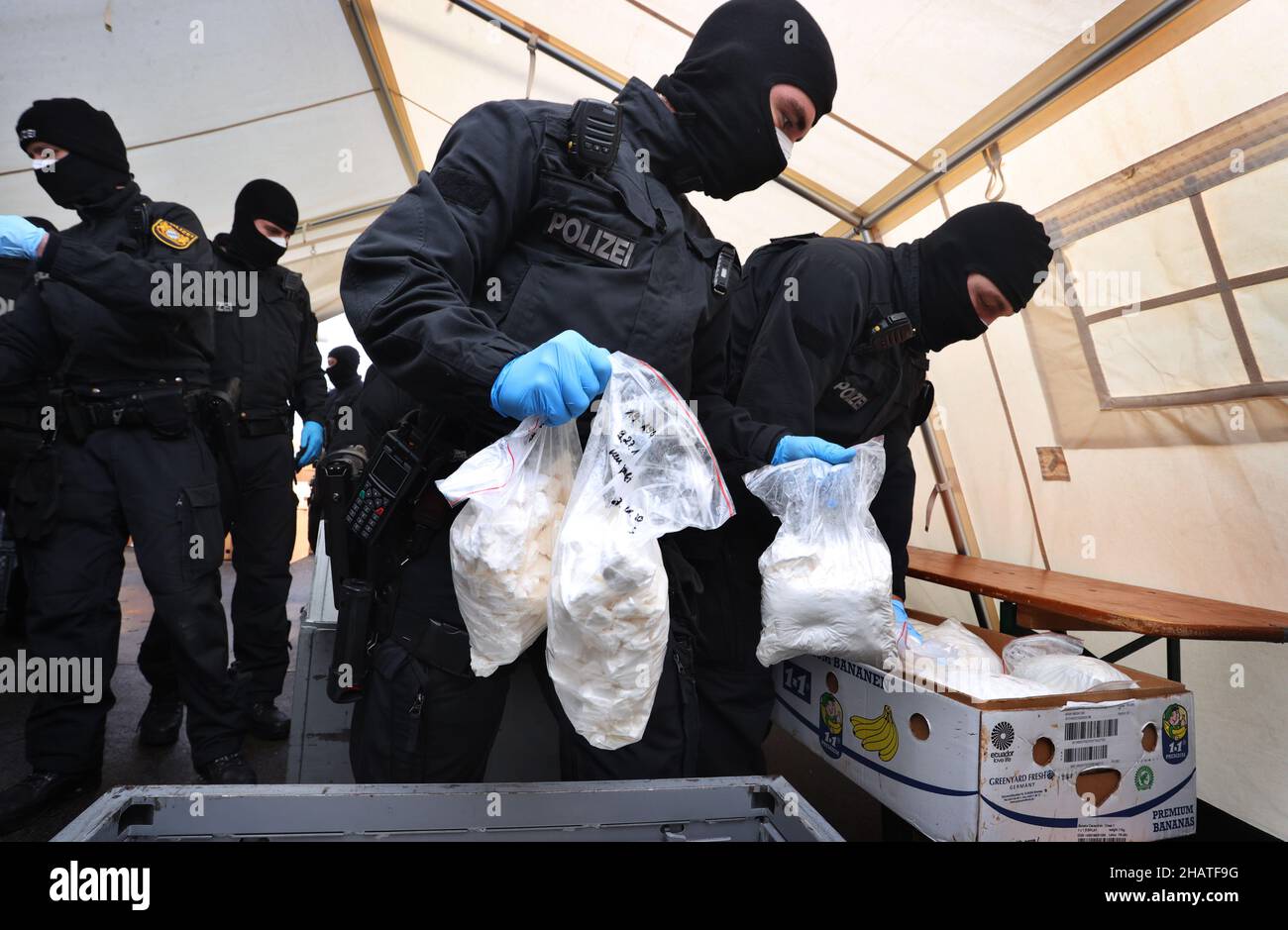 Germany. 14th Dec, 2021. Bavarian riot police officers prepare bags of ...