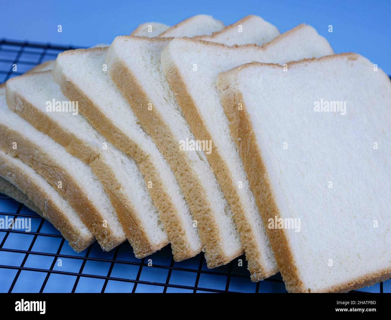 set of toast bread on pastel blue background Stock Photo - Alamy