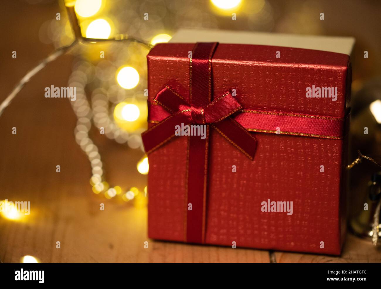 red gift boxes and holiday Christmas lights Stock Photo - Alamy