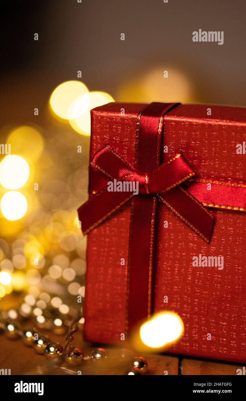 red gift boxes and holiday Christmas lights Stock Photo - Alamy