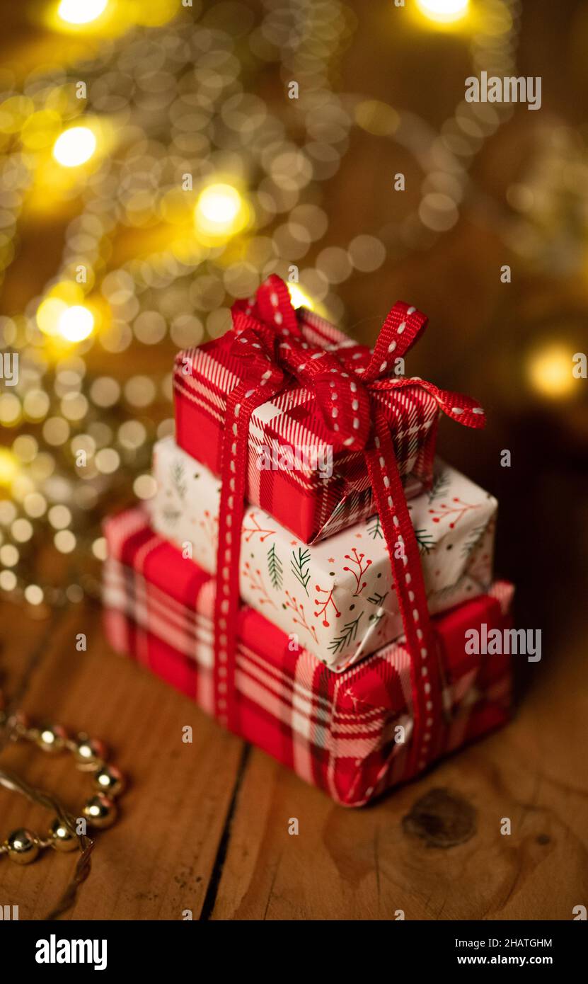 red gift boxes and holiday Christmas lights Stock Photo - Alamy
