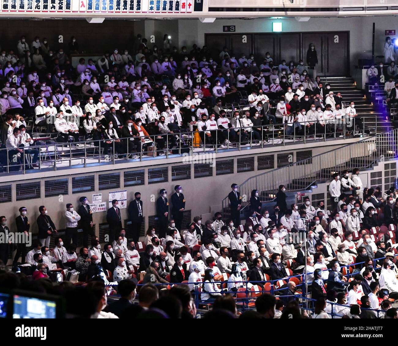 Audiences watch the match while wearing white clothes during the IBF ...