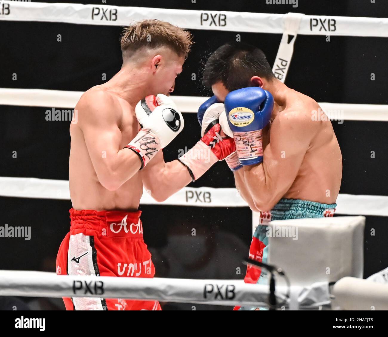 Naoya Inoue (white gloves) of Japan and Aran Dipaen (blue gloves) of ...